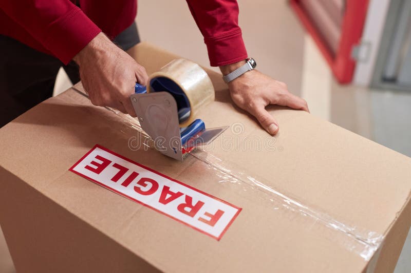 Storage Worker Taping Boxes in Warehouse Stock Image - Image of pack ...