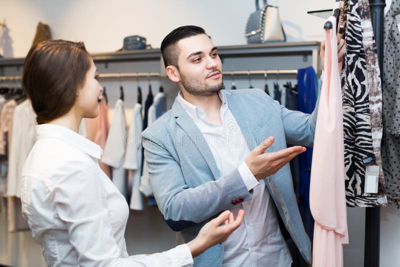 Store Clerk Serving Purchaser Stock Photo - Image of relaxed, commerce ...