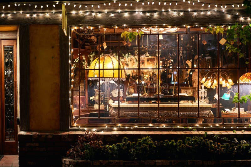 Store Front of an Antique Store at Night after Hours Stock Photo ...