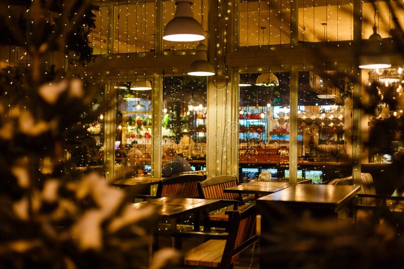 A store front at night stock photo. Image of filled - 207361360