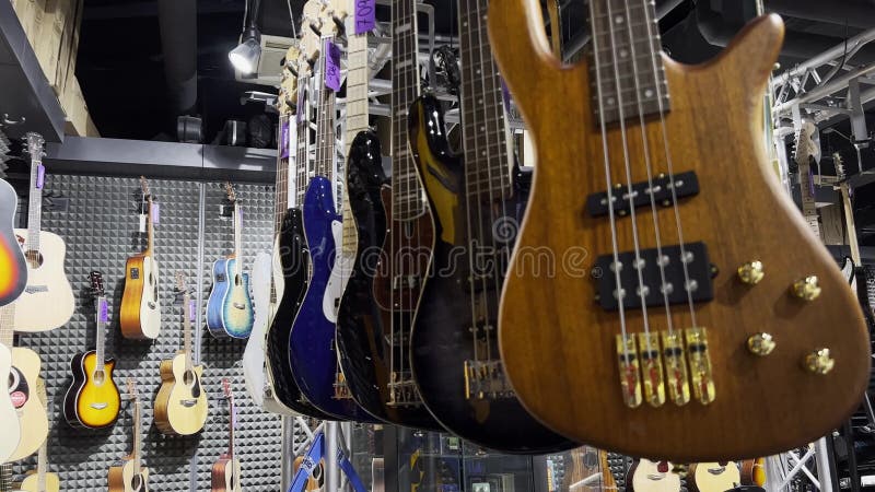A Store with Musical Instruments, Classical and Electric Guitars Stock ...