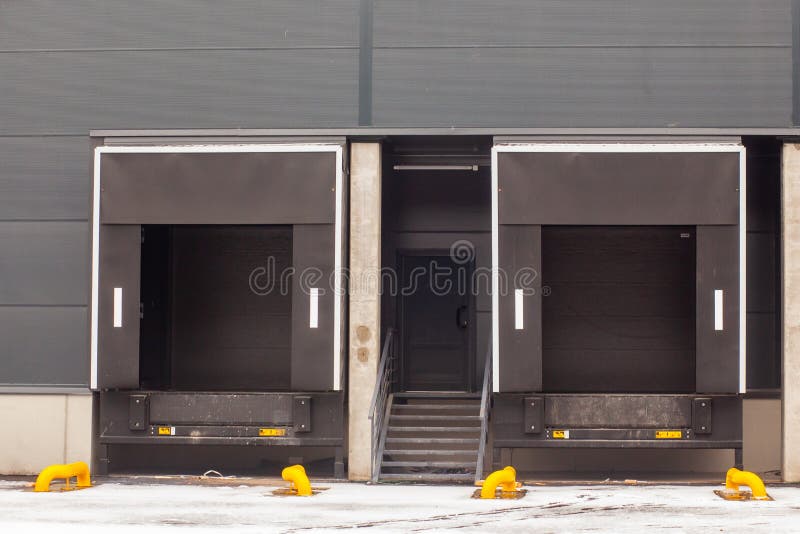 Gates for Unloading Trucks in the Warehouse Stock Photo - Image of city ...