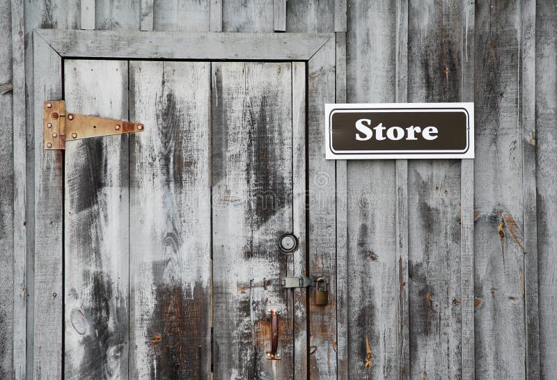 Store Sign on Grey Wall stock photo. Image of slabs, sign - 3670762