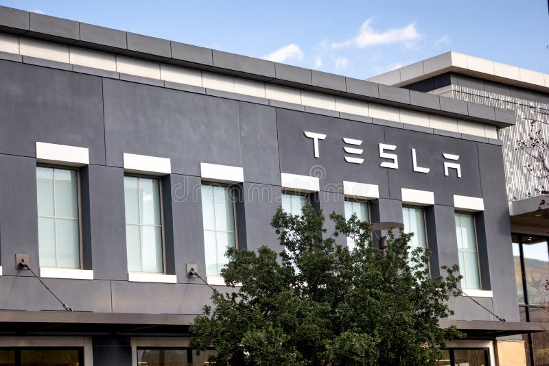 Store sign for Tesla editorial image. Image of emission - 143458720