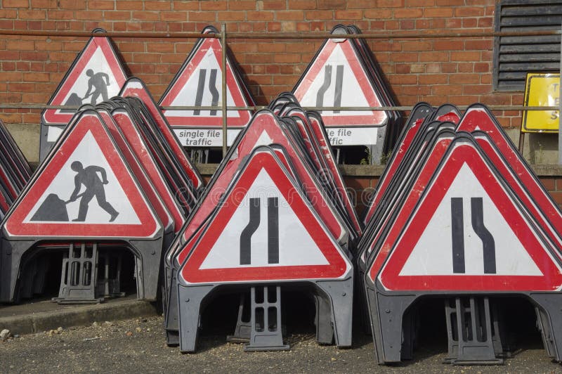 A Store of Triangular Road Warning Signs Stock Photo - Image of work ...