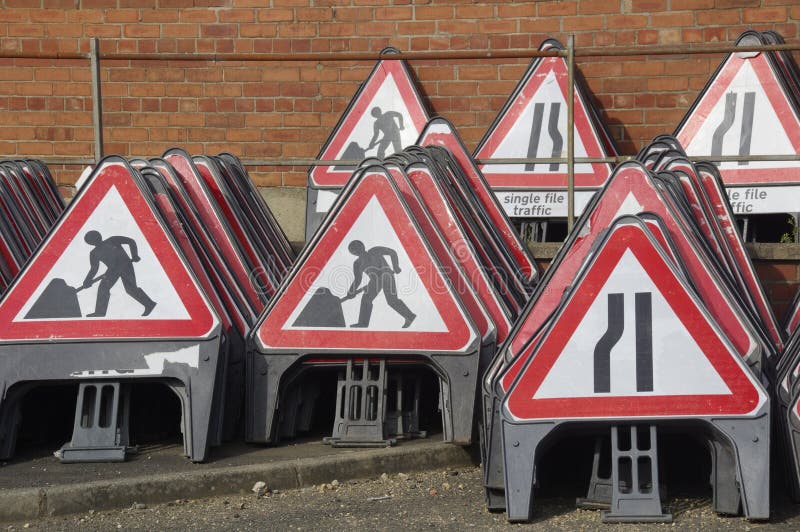 A Store of Triangular Road Warning Signs Stock Photo - Image of stored ...