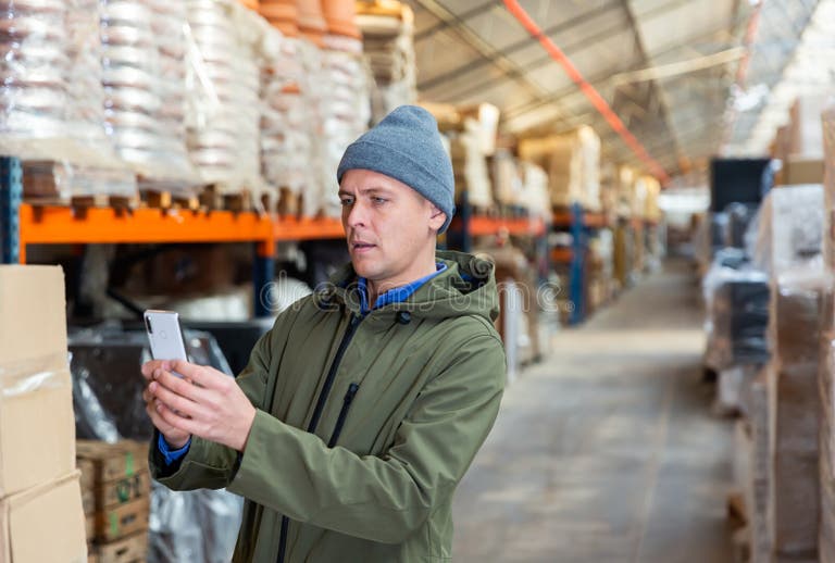 Store Warehouse Employee Scans Barcode on Boxes Using Phone Stock Image ...
