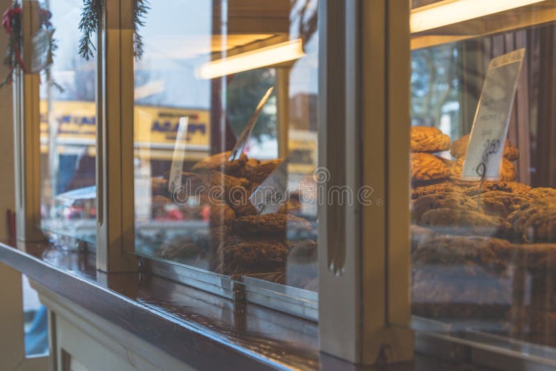 Storefront with cookies stock image. Image of eating - 65871311
