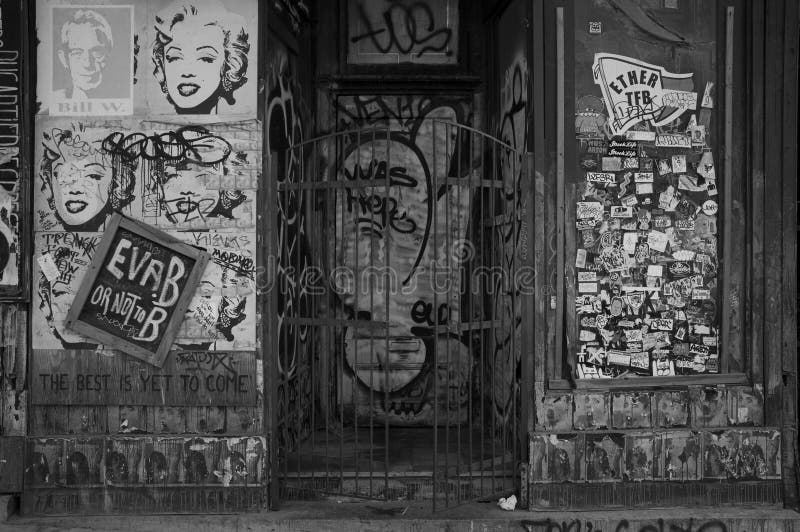 Storefront Plastered with Graffiti and Posters Editorial Image - Image ...