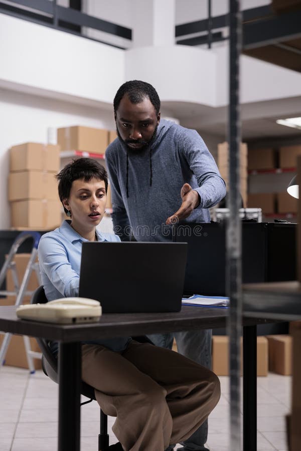 Storehouse Employees Analyzing Package Shipping Checklist Searching for ...