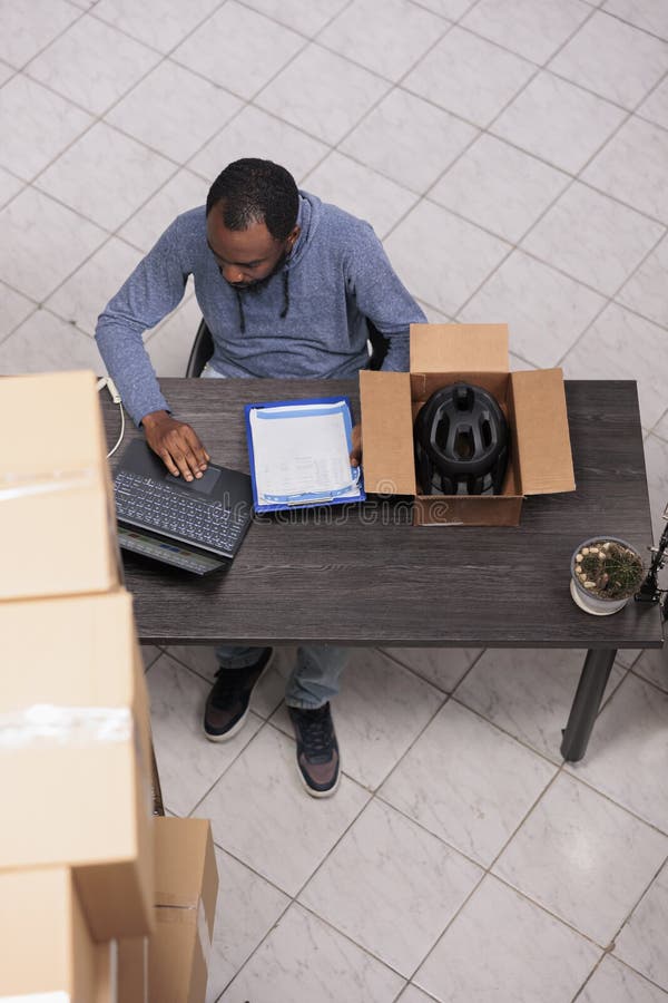 Storehouse Supervisor Putting Helmet Order in Cardboard Box Preparing ...