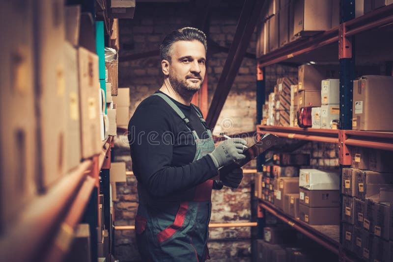 Storekeeper with Manual Pick List on a Warehouse Stock Photo - Image of ...
