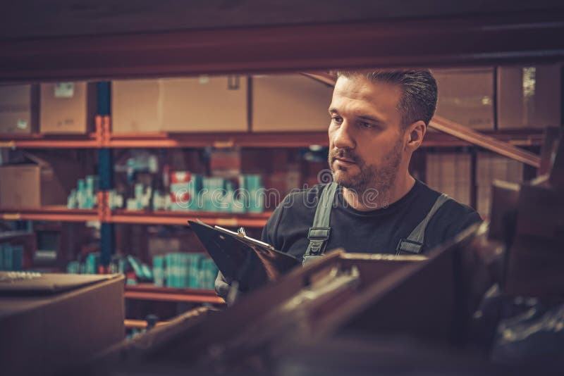 Storekeeper with Manual Pick List on a Warehouse Stock Photo - Image of ...