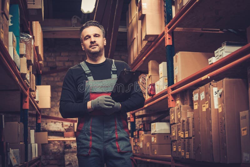 Storekeeper with Manual Pick List on a Warehouse Stock Photo - Image of ...