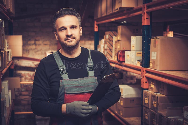 Storekeeper with Manual Pick List on a Warehouse Stock Image - Image of ...