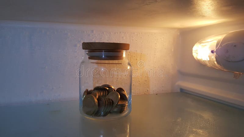 Storing Coins in Jar in Refrigerator Money Storage Methods Stock Image ...