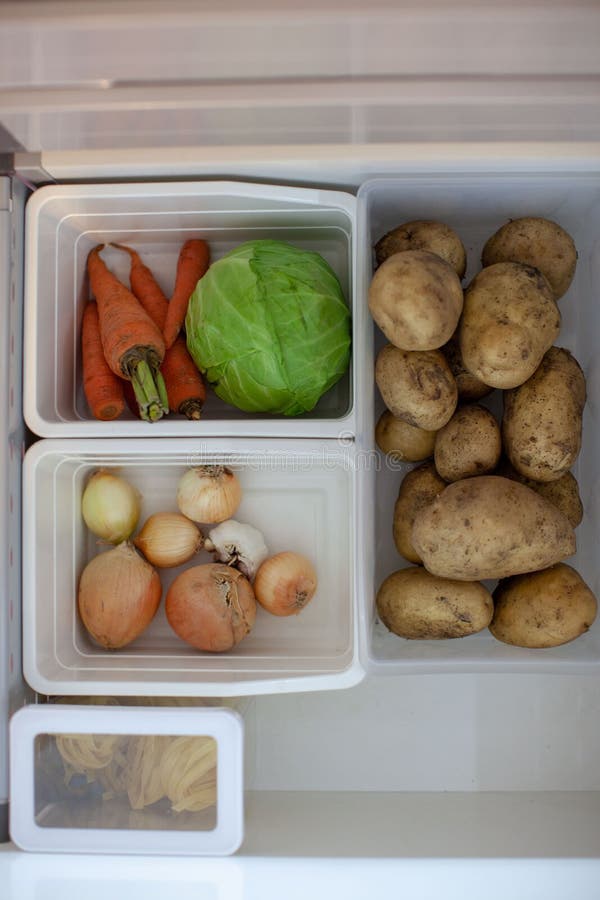 Storing Vegetables in the Kitchen. Stock Photo - Image of container ...