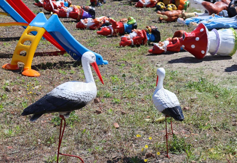 Stork Figurine and Other Toys at the Playground Stock Photo - Image of ...