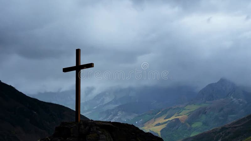 Storm Approaching Mountain Peak with Cross Stock Video - Video of ...