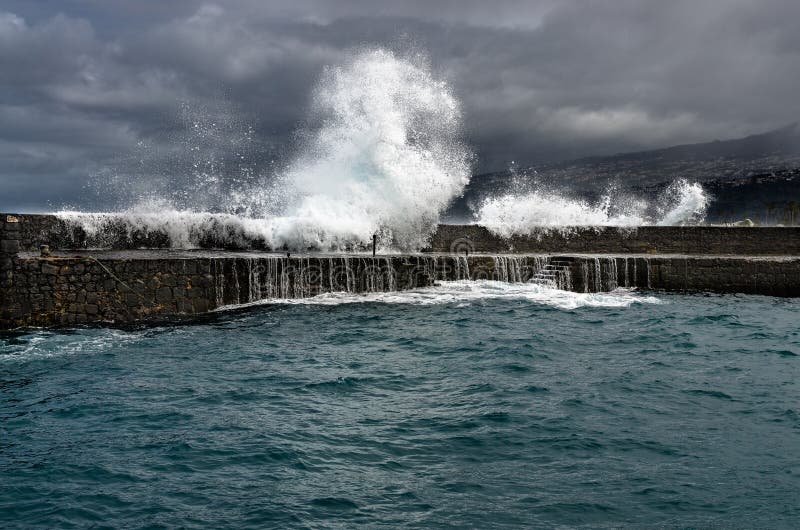 Storm on the Atlantic Ocean There are Heavy Waves at the Harbor Wall ...