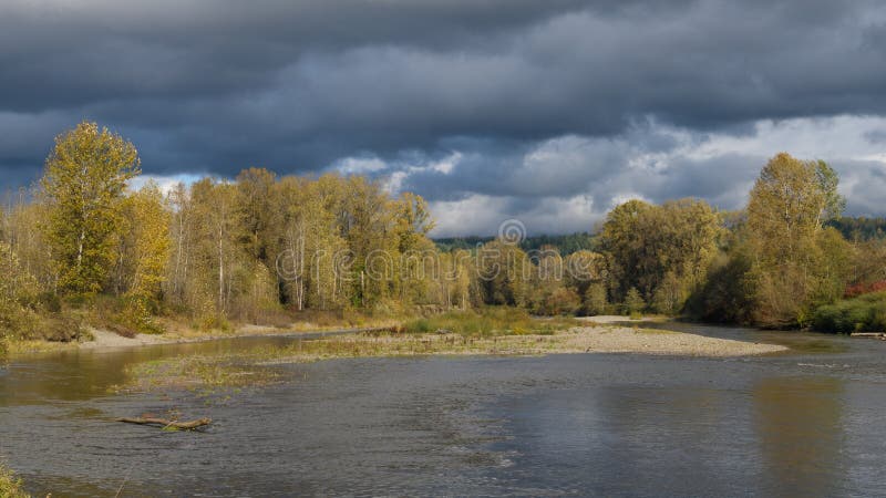 Storm Clouds Above the Snoqualmie River in Late Fall with Low Water ...