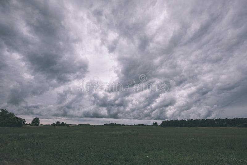 Storm Clouds Forming Over the Countryside - Vintage Retro Look Stock ...