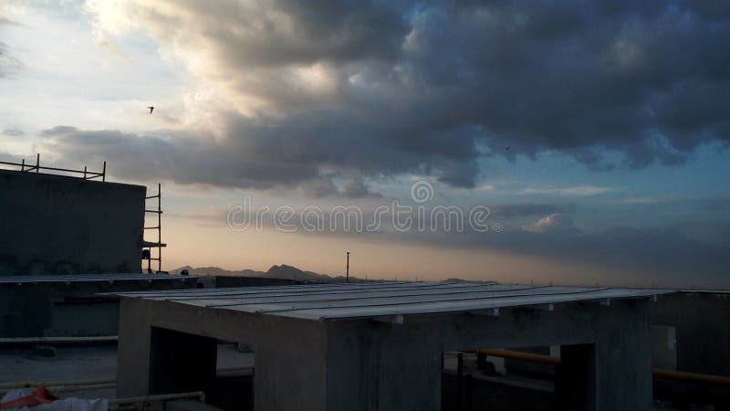 Storm Clouds Gathered Over a Under Construction Project Site. Stock ...