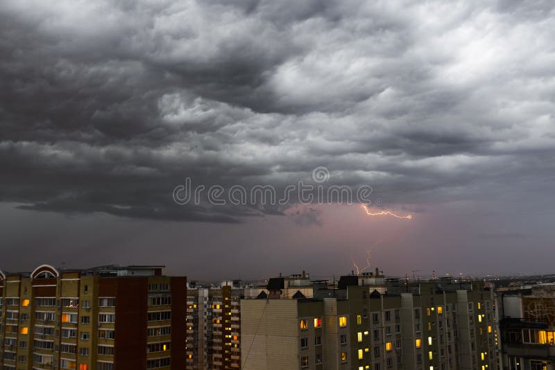 Storm Clouds, Heavy Rain. Thunderstorm and Lightning Over the City ...