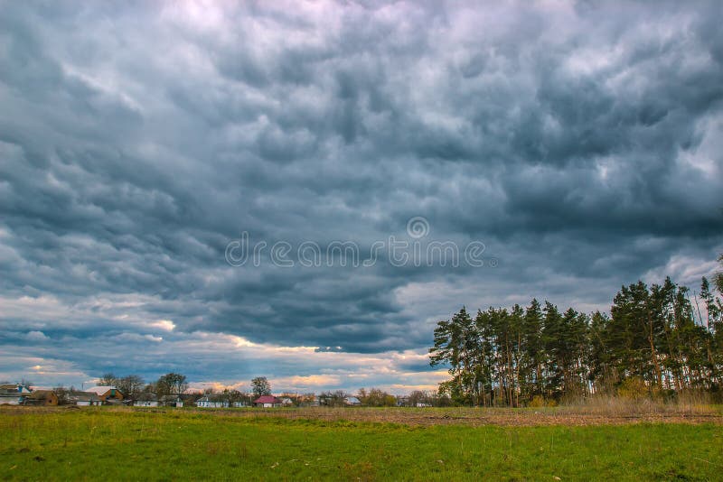 Storm Clouds Moving Over the Field Stock Image - Image of evening ...