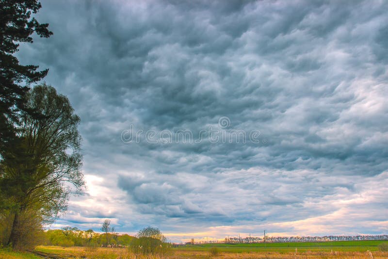 Storm Clouds Moving Over the Field Stock Image - Image of land, dynamic ...