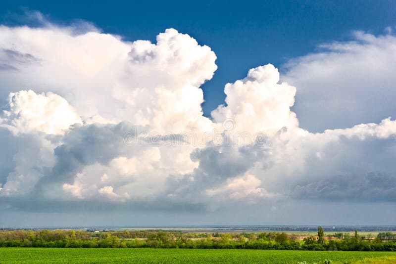Storm Clouds Over Field and Forest Belt Stock Photo - Image of forest ...