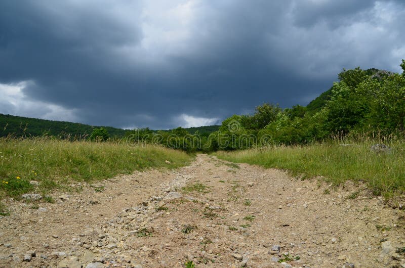 Storm Clouds Over Field Road No 3 Stock Image - Image of field, 3nthe ...