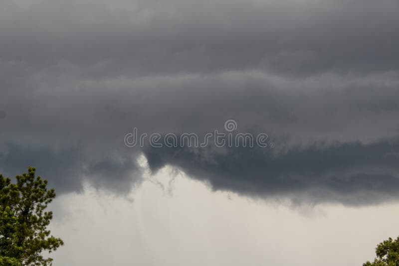 Storm Clouds Over the Tree Line Stock Image - Image of blue, gray ...