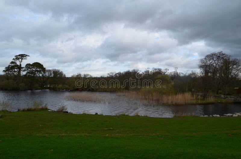 Storm Clouds Over a Wide River in Ireland Stock Image - Image of views ...