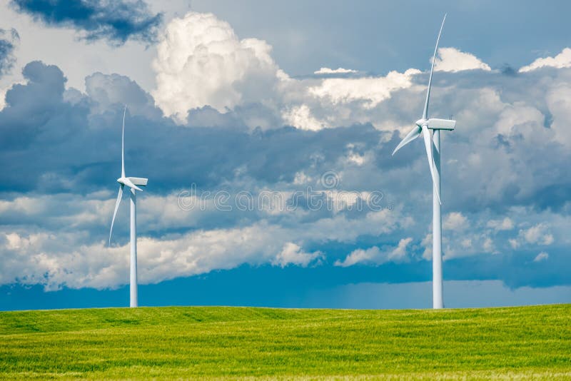 Storm Clouds Over Wind Turbines in a Wheat Field Stock Image - Image of ...