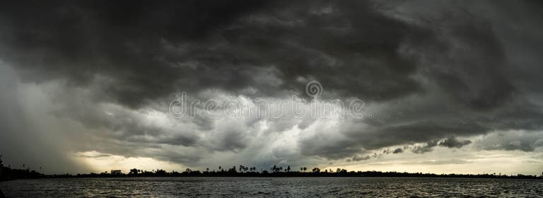 Storm Clouds with the Rain Over the River Stock Photo - Image of ...