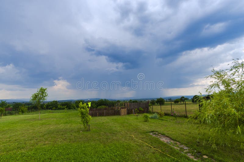 Storm clouds at the spring stock photo. Image of storm - 183165952