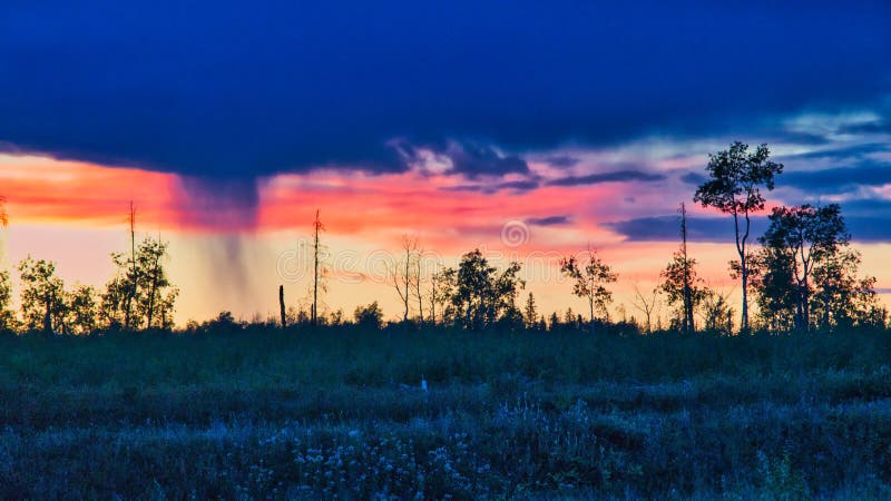 Storm Clouds at Sunset Coming in Over the Horizon Stock Image - Image ...