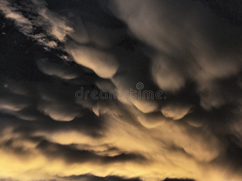 Storm Clouds on Sunset. Light in the Dark and Dramatic Storm Clouds Stock Image - Image of light ...