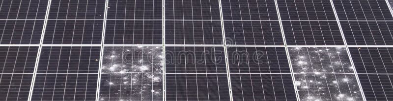 Storm-damaged Solar Panels on a Grid with Visible Damage Affecting ...