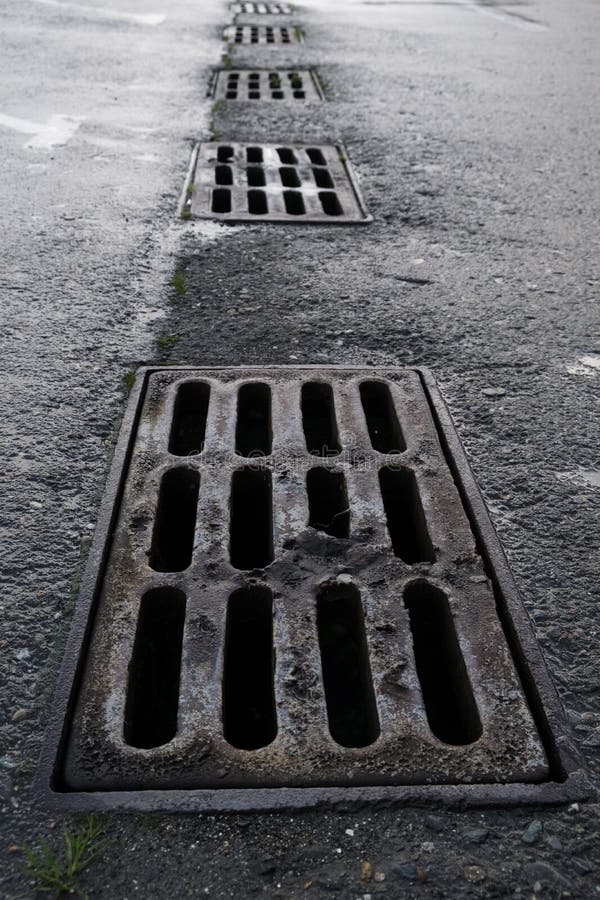 Water Pouring Into Street Storm Drain Stock Photo - Image of flowing ...