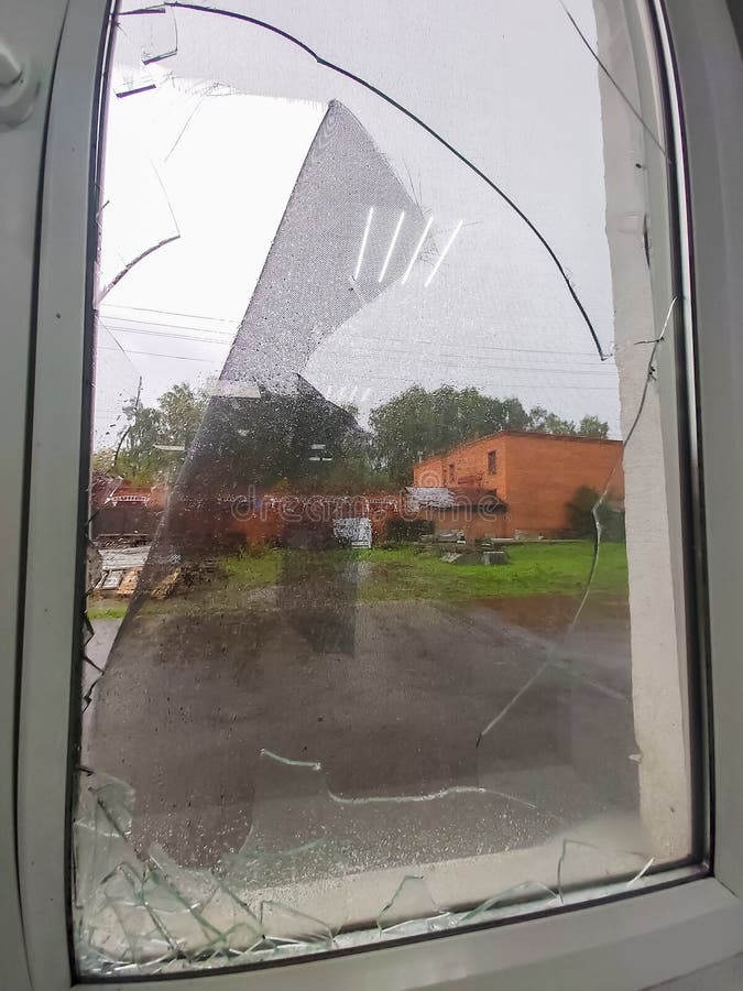 The Storm Left a Broken Window with Shards of Glass Stock Photo - Image ...