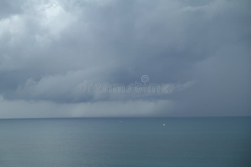 A Storm Over the Colorful Atlantic Ocean with Dark Clouds Stock Image ...