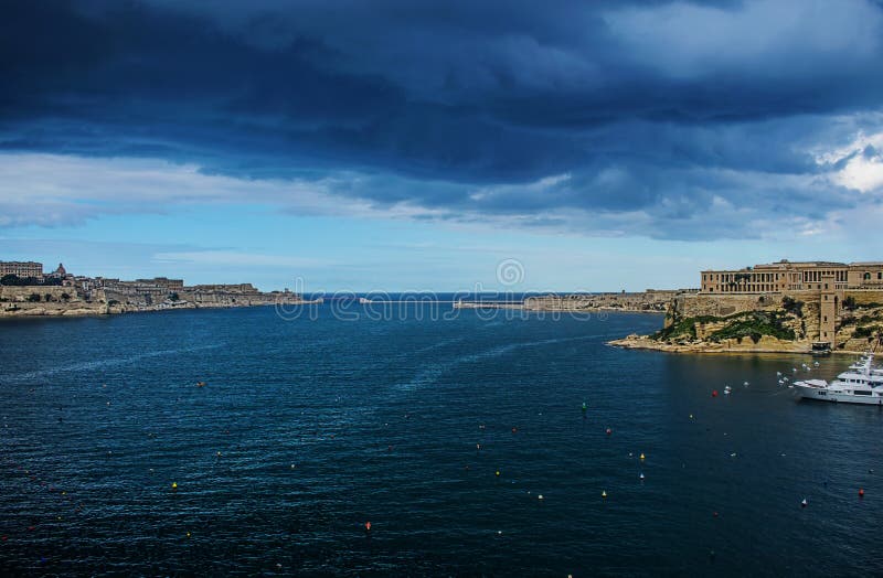 Storm Over the Harbor in Malta Stock Image - Image of black, boats ...