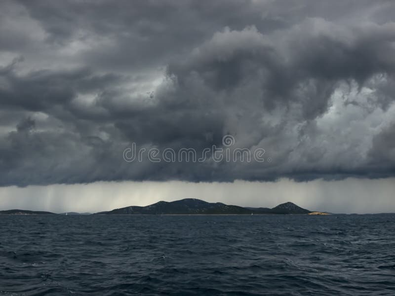 Storm over islands stock photo. Image of clouds, seaside - 31582854