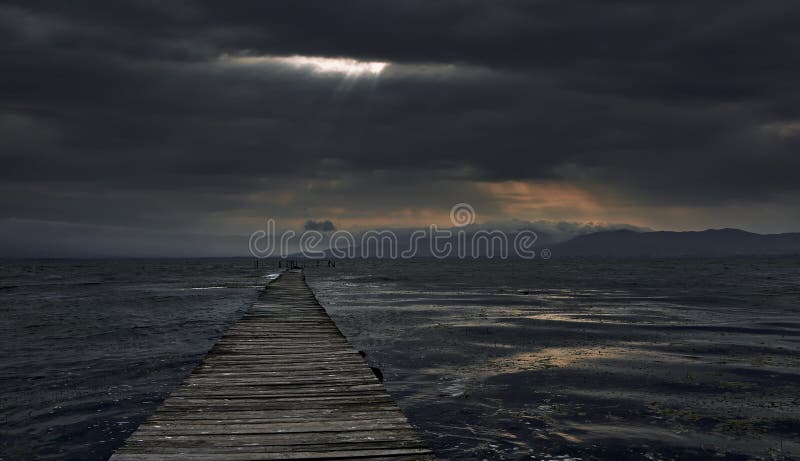 Storm over lake stock photo. Image of storm, beams, landscape - 30991550