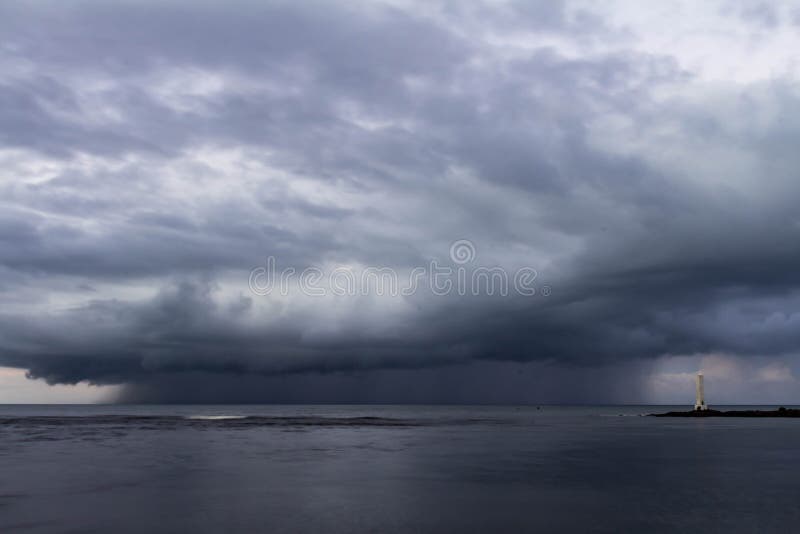 Storm Over the Sea. Huge Cloud Throwing Water in the Form of Rain Stock ...