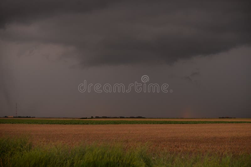 Storm on the Plain Over the Land Cultivated with Wheat Stock Photo ...