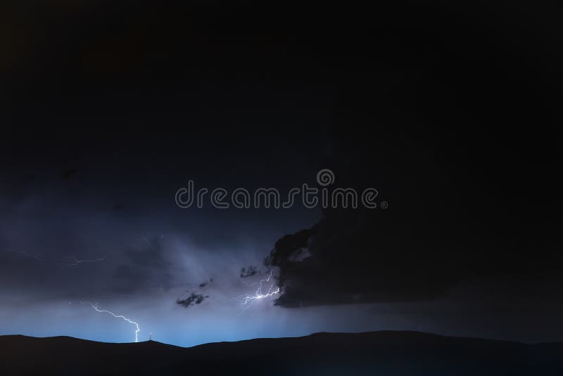 Storm Raging in Mountains with Litghtning Stock Photo - Image of ...
