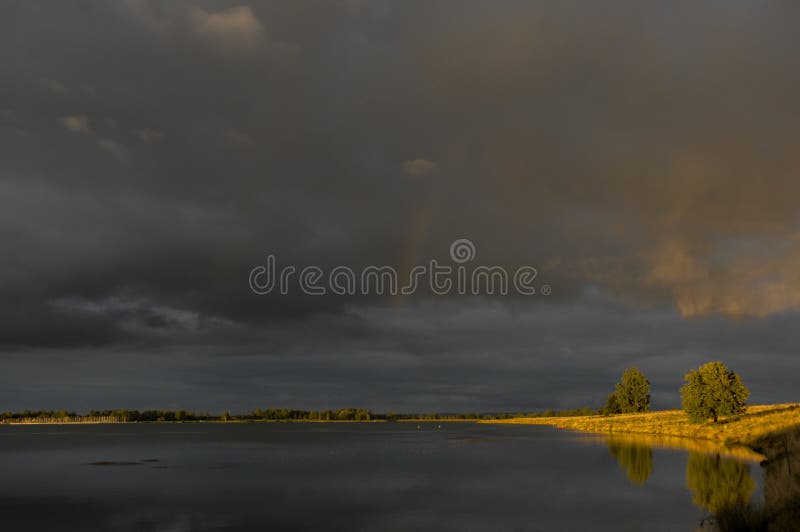 Storm and Rain Over Lake, France, Sunset Stock Photo - Image of cyclone ...